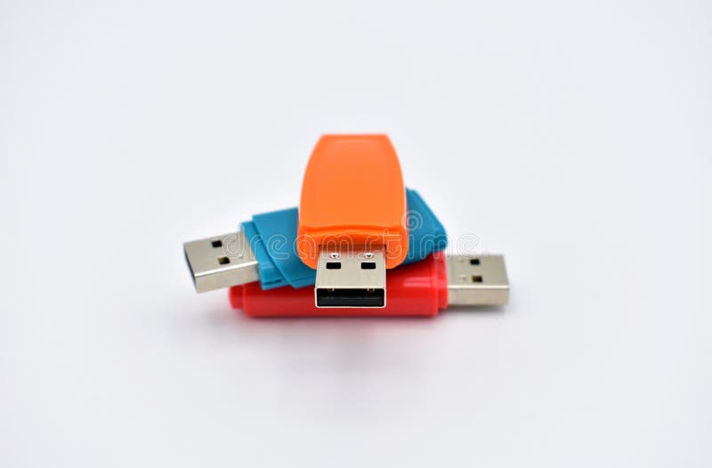USB Flash Memory Drives with Colours, Orange, Blue and Red, on a White ...