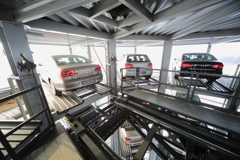 Three Vehicles on the Top Floor of a Transparent Construction Stock ...