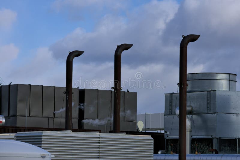 Three Venting Columns on a Rooftop Heat-transfer Unit Stock Image ...