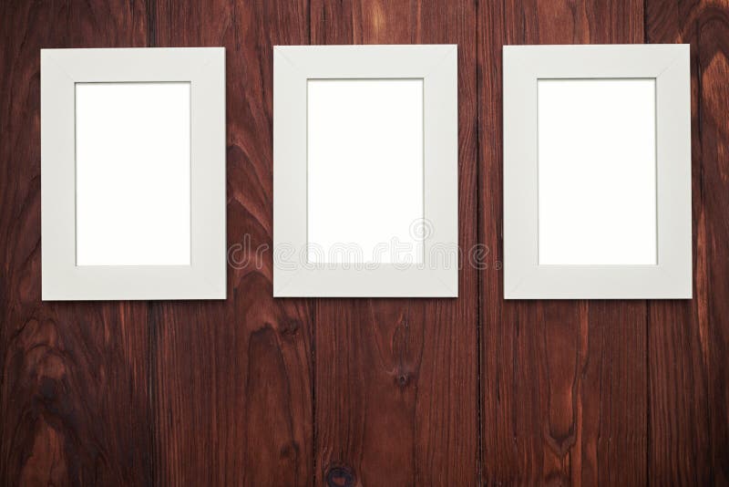 Three Vertical Frames on Brown Wooden Desk Stock Image - Image of ...