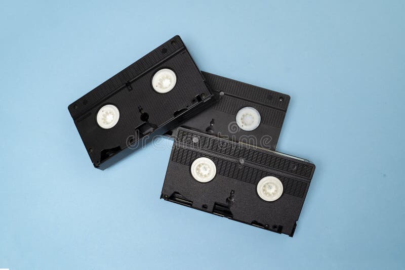 Three Video Tapes on Blue Background ; VHS Tapes Stock Image - Image of ...