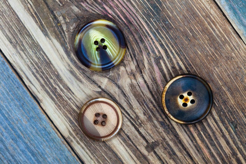Three vintage buttons stock photo. Image of scratched - 67661202