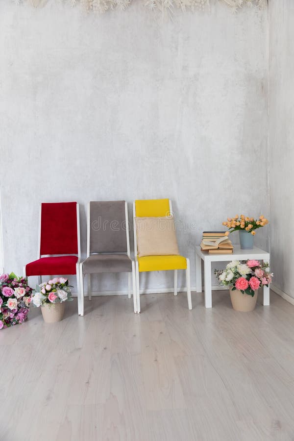 Three Old Vintage Chairs in the Interior of an Empty White Room Stock ...