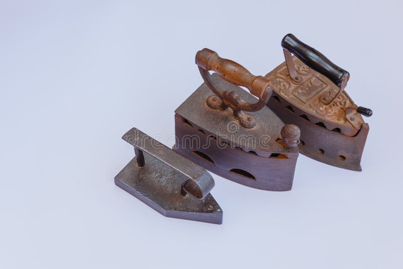 Three vintage irons stock image. Image of black, wall - 112199581