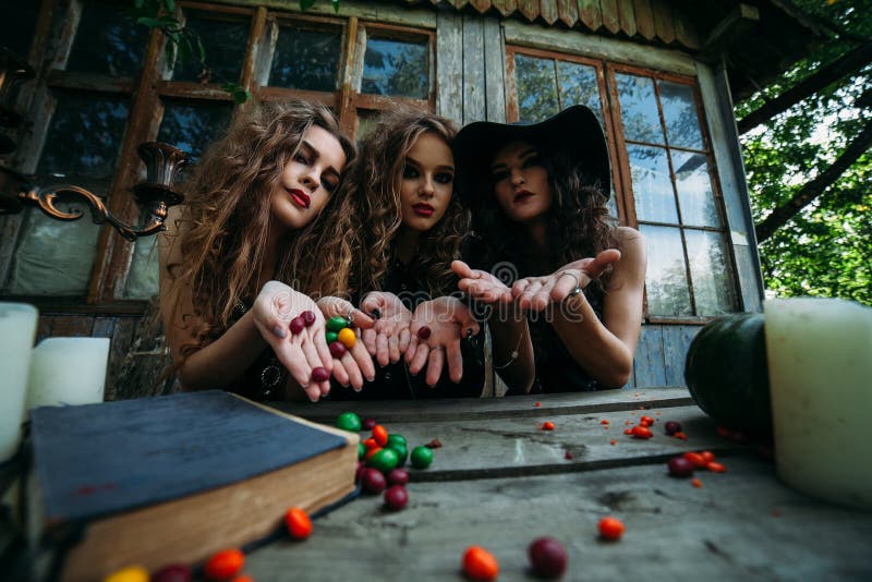 Three Vintage Witches Perform Magic Ritual Stock Photo - Image of ...