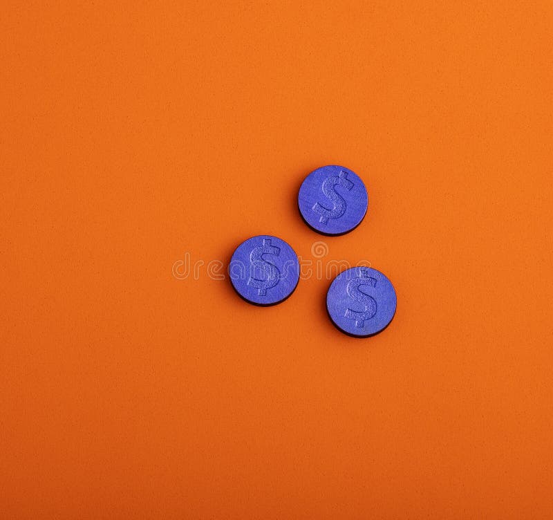 Three Violet Coins on an Orange Background - Conceptual Idea of ...