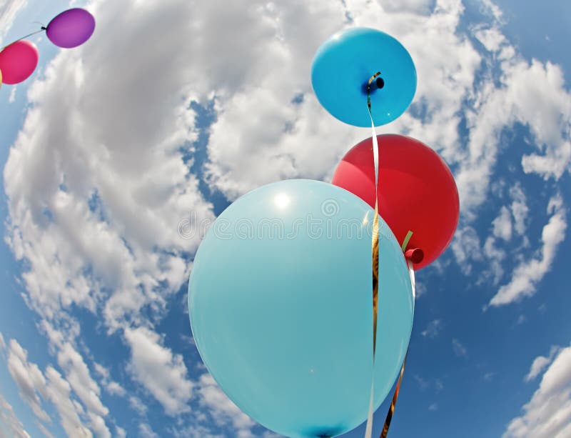 Three Vivid Color Balloons in Blue Sky Stock Photo - Image of helium ...