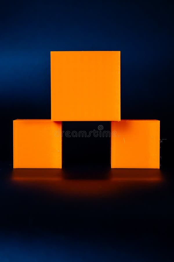 Geometric Orange Cubes Made of 3d Plastic on a Black Box, Minimalist ...