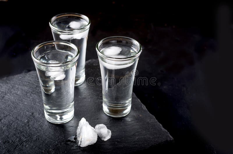 Ice Cold Russian Vodka Shots Stock Photo - Image of booze, glasses ...