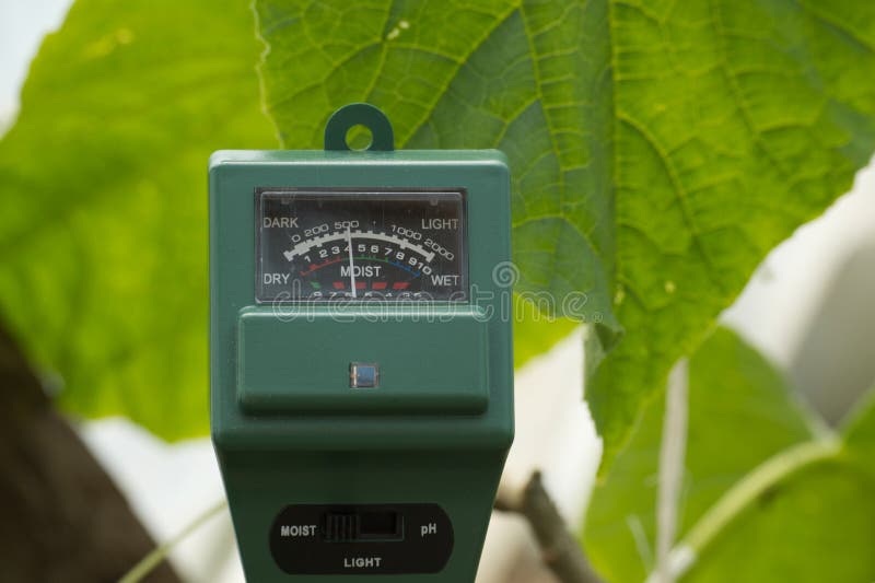 Three Way Meter PH, Light and Moisture in the Soil Stock Photo - Image ... Three Way Meter PH, Light and Moisture in the Soil Stock Photo - Image ...