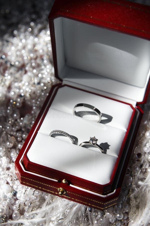 Three Wedding Rings in a Red Box Stock Image - Image of symbol, jewel ...