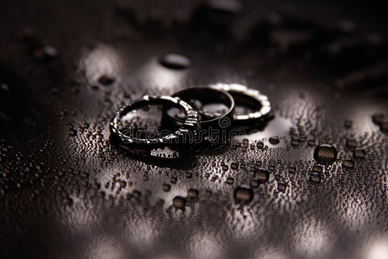 Three Wedding Rings. the Rings are Highlighted with Beautiful Light ...