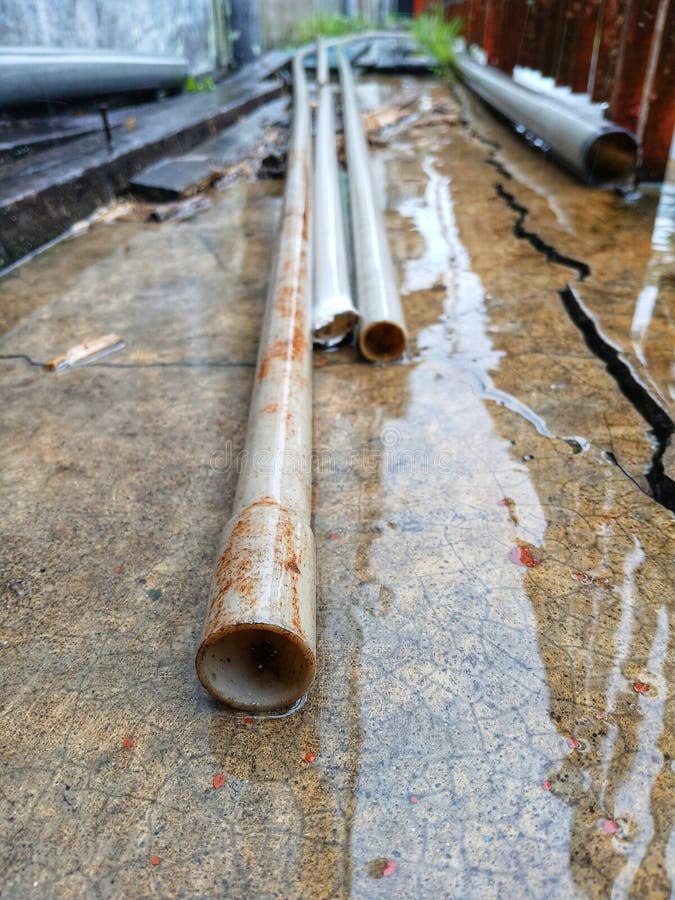 Three wet pipes stock photo. Image of rainwater, water - 355363260