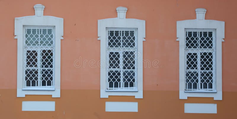 Three White Barred Windows in the Wall Stock Image - Image of city ...