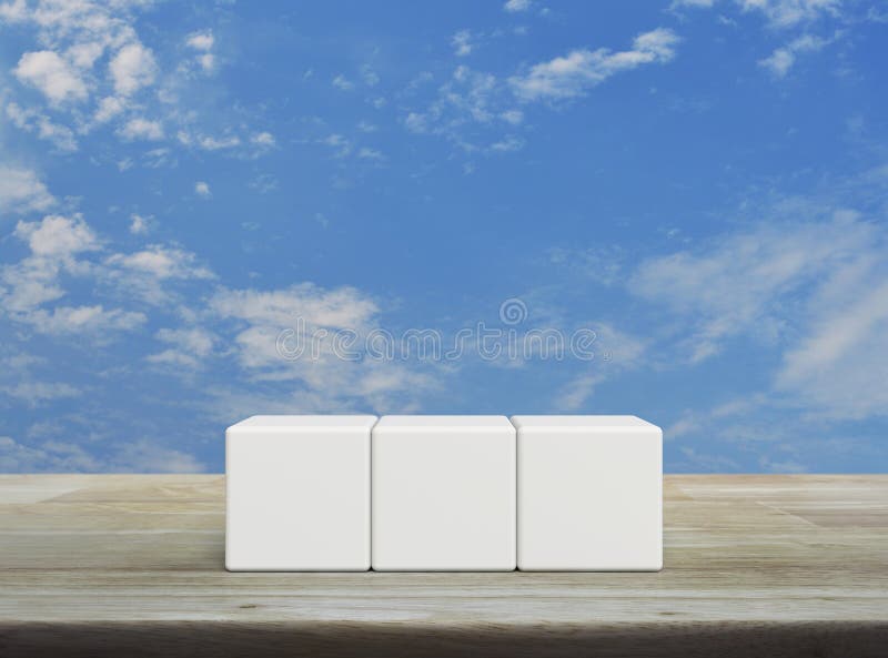 Three White Block Cubes on Wooden Table Stock Image - Image of industry ...