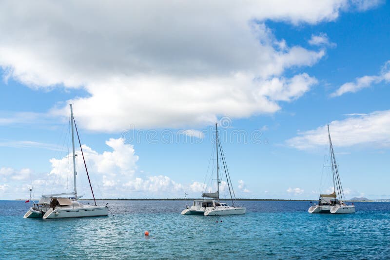 Three White Catamarans in Belize Stock Photo - Image of yacht, three ...