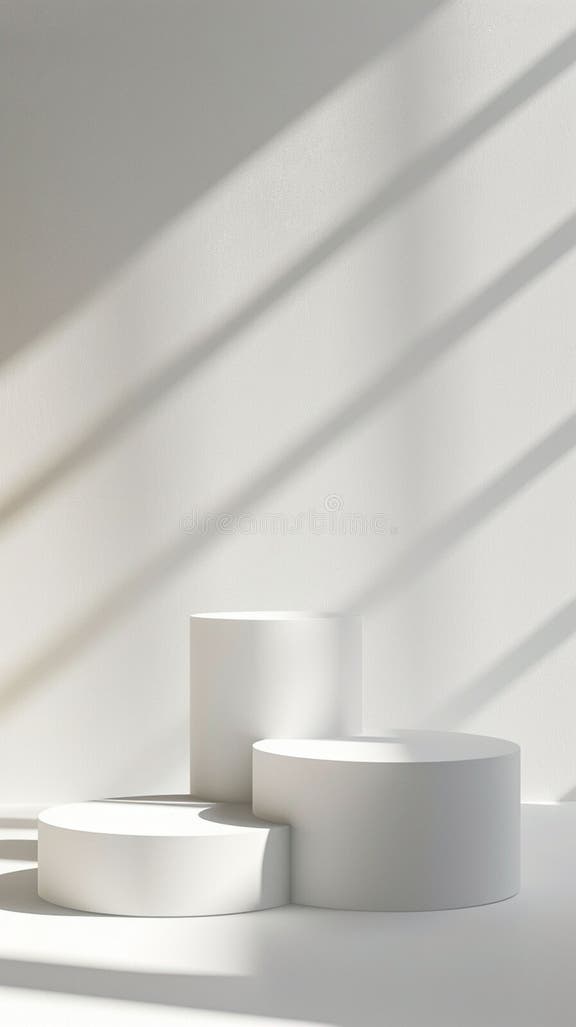 Three White Cylindrical Platforms with Diagonal Light and Shadows in a ...