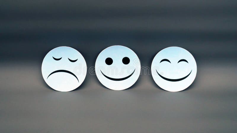 Three White Emotion Faces Displaying Sad, Neutral, and Happy ...