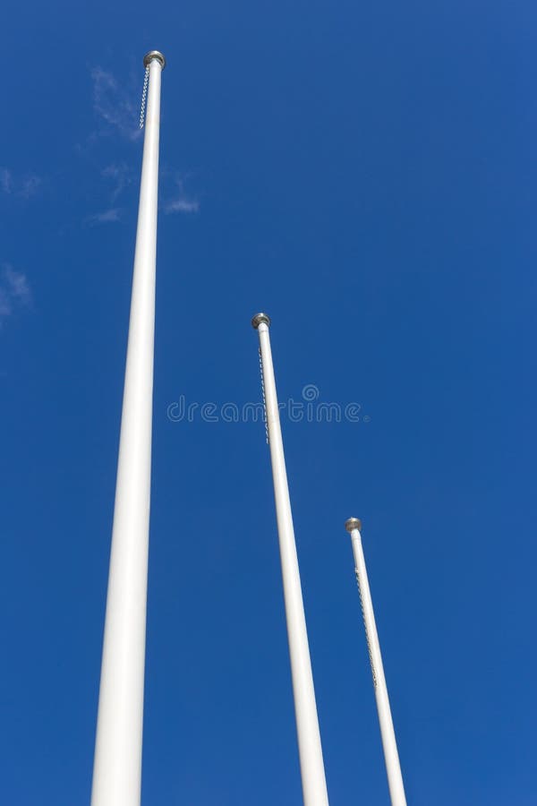 Three Empty Flag pole stock photo. Image of people, flagpole - 60789910