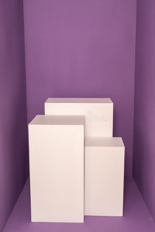 Three White Rectangular Boxes Against Purple Background. Product ...