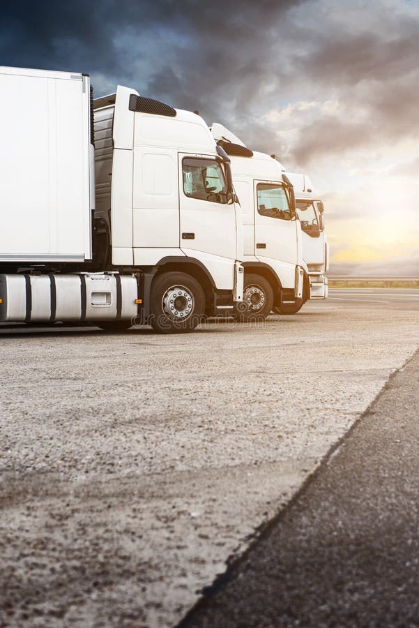 Three Trucks in a Row of a Transporting Company Stock Photo - Image of ...