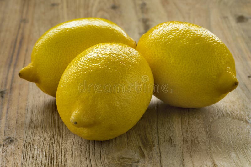 Three whole fresh lemons stock photo. Image of fresh - 109391456