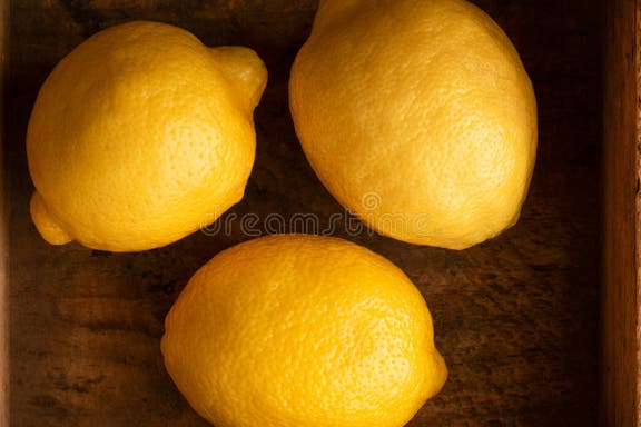 Three Whole Lemons in a Wood Box Stock Image - Image of fruit, lemons ...