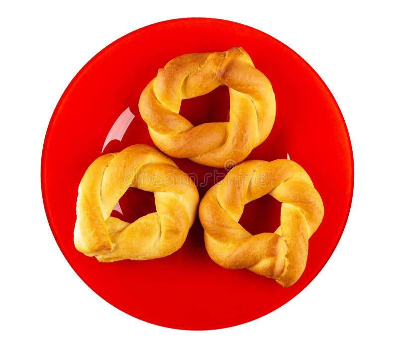 Wicker Buns in Shape Ring in Red Plate Isolated on White. Top View ...
