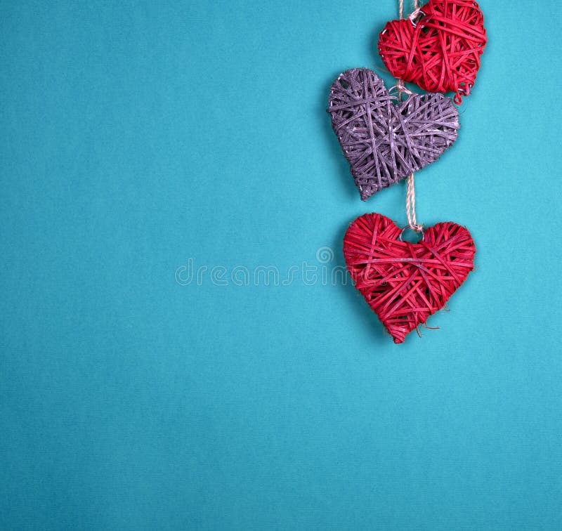 Three Wicker Hearts Hang on a Rope Stock Image - Image of abstract ...