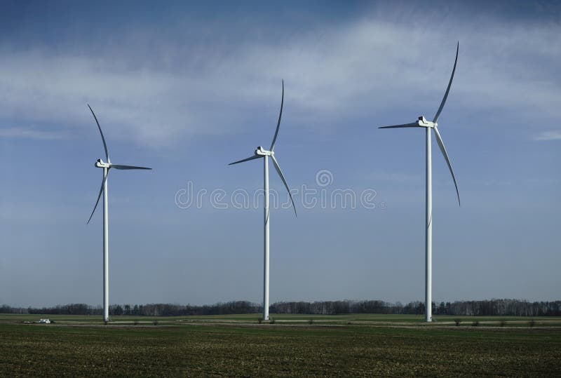 Three Wind Turbines on Field Stock Photo - Image of turbine ...