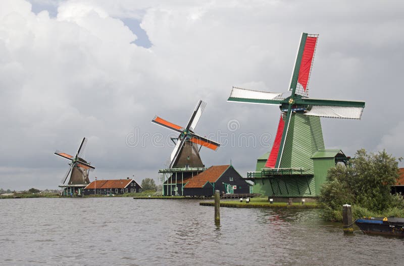 Three Windmills in Holland stock photo. Image of zaandam - 27075292