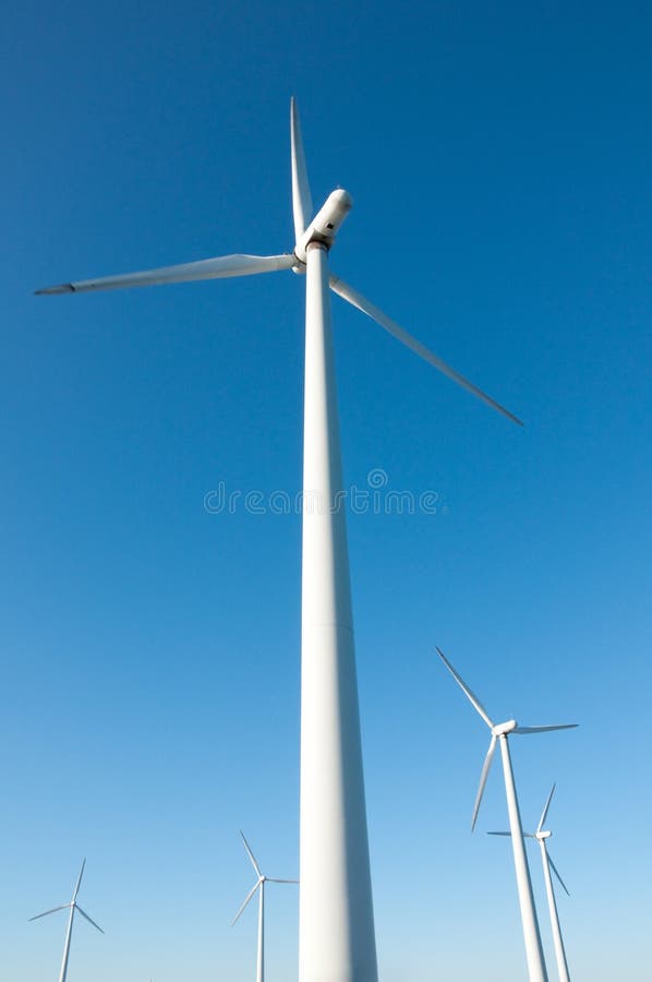 Three Windmills Near Frozen Lake Stock Image - Image of electricity ...