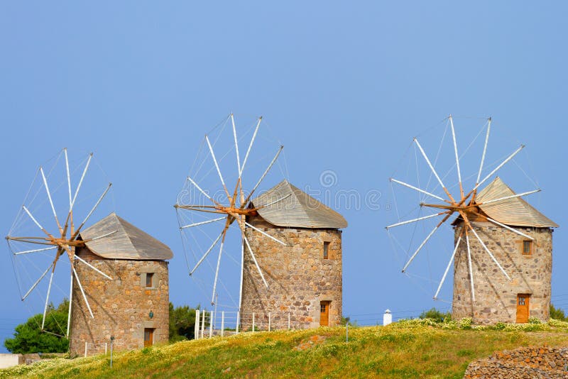 Three windmills in Patmos stock photo. Image of 1000024450 - 72705776