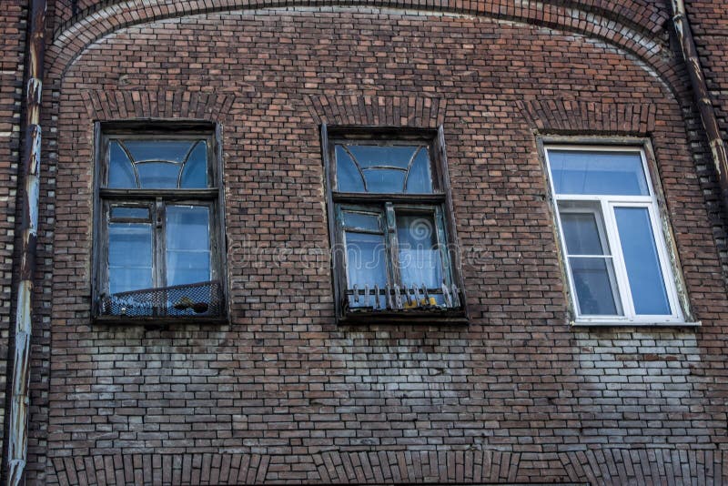 Three Windows in an Old House Stock Image - Image of brick, destroyed ...