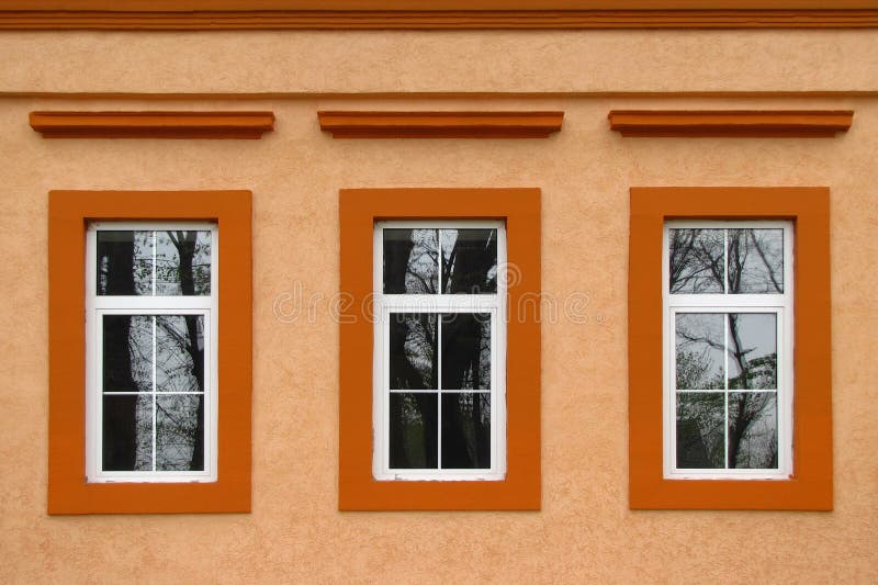 Three Windows on the Orange Wall Stock Photo - Image of house, three ...