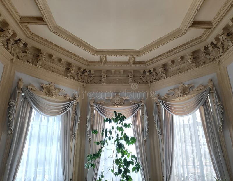 Three Windows with Patterns and Curtains in an Antique Castle Room ...