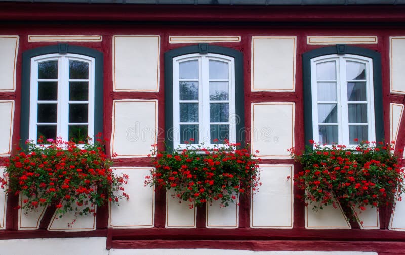 Three Windows in a Row on a Building Editorial Photo - Image of burg ...