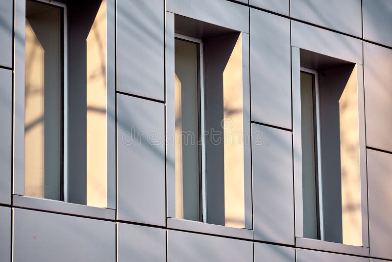 Three Windows with Shadows on the Building in the Urban Environment ...