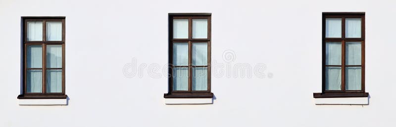 Three Windows on the Side of a White Building Stock Image - Image of ...