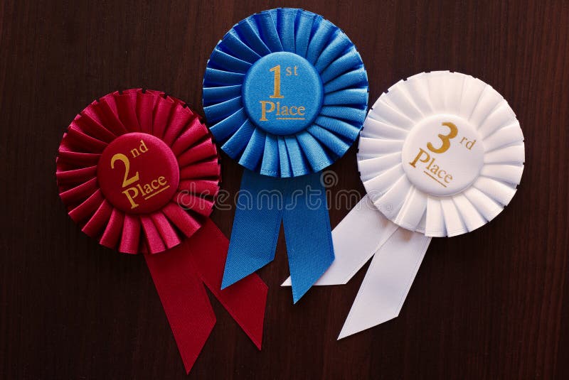 Three winners rosettes stock photo. Image of achievement - 44535308