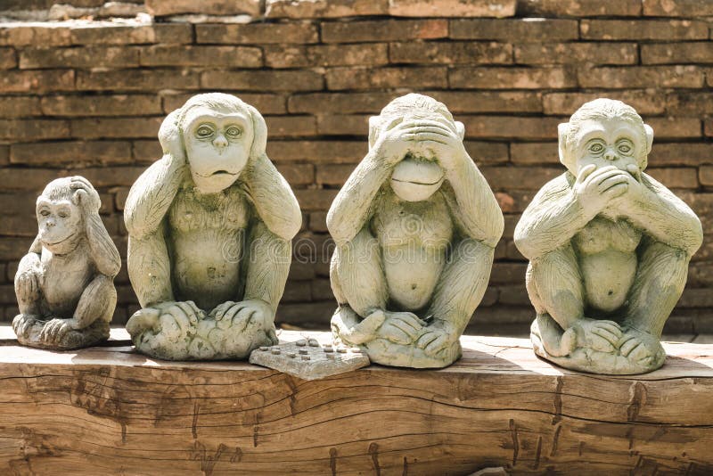 Three Wise Monkeys and a Fourth Monkey Scratching His Head in Wat Umong ...