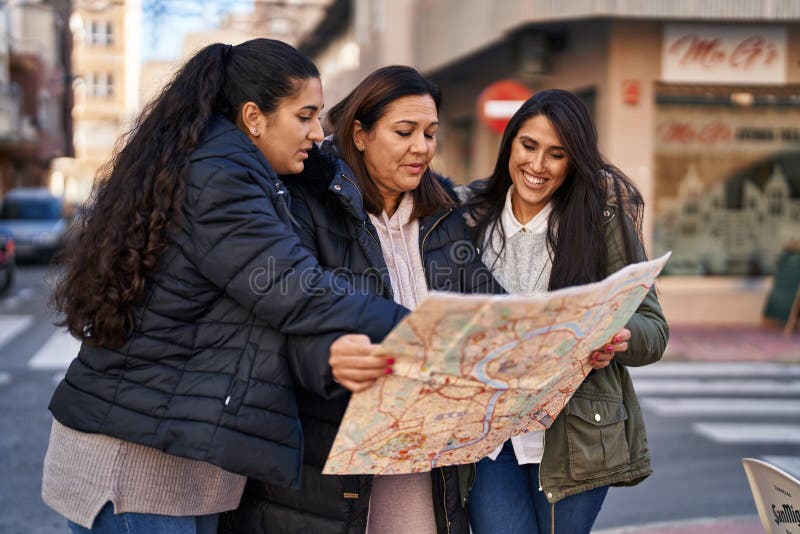 Three Woman Mother and Daughters Holding Map at Street Stock Photo ...