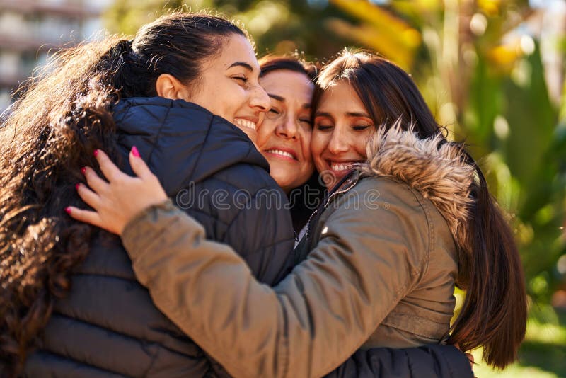 Three Woman Mother and Daughters Hugging Each Other at Park Stock Image ...
