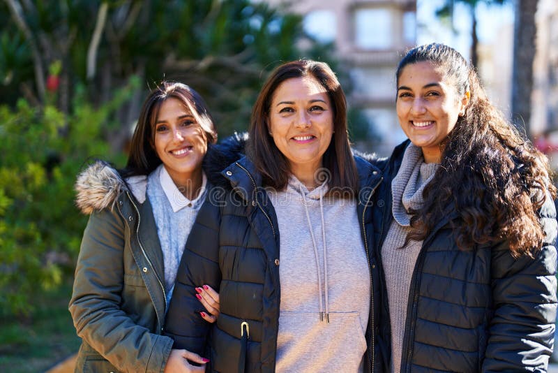 Three Woman Mother and Daughters Hugging Each Other at Park Stock Photo ...