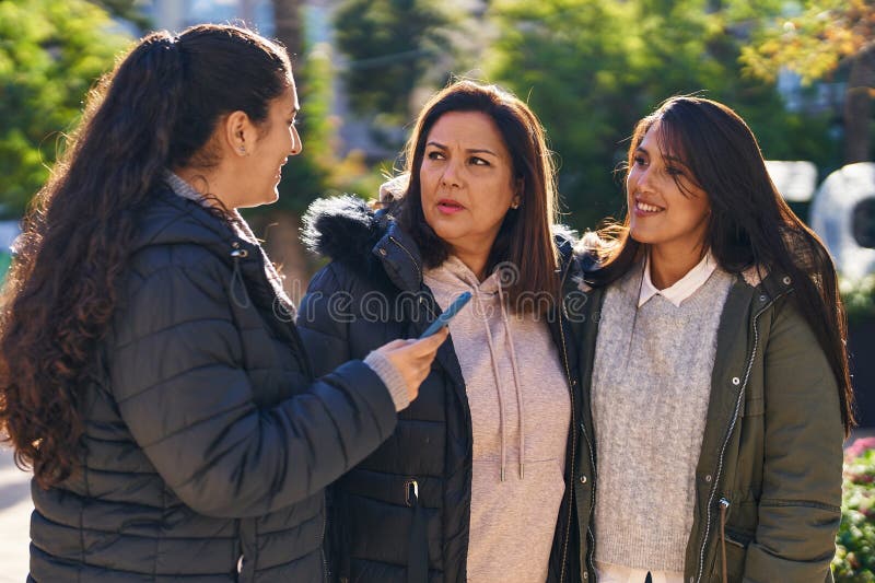 Three Woman Mother and Daughters Using Smartphone at Park Stock Image ...