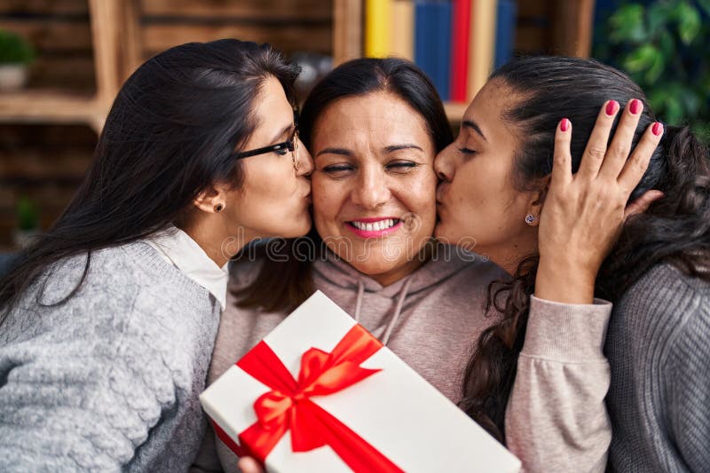 Three Woman Surprise with Gift Sitting on Sofa at Home Stock Photo ...