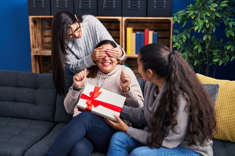 Three Woman Surprise with Gift Sitting on Sofa at Home Stock Image ...