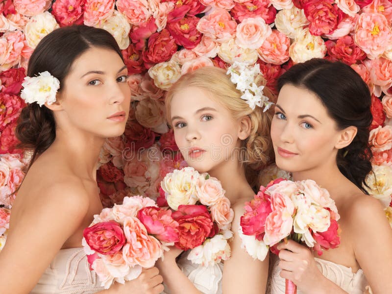 Three Women with Background Full of Roses Stock Photo - Image of beauty ...