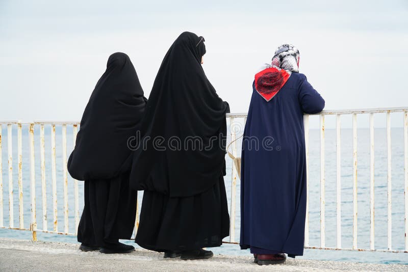 Three Women in a Burqa Look at the Sea Stock Photo - Image of spring ...