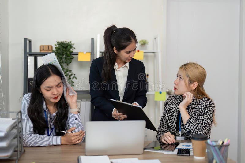 Professionals Discussing Financial Strategies while Facing Challenges ...